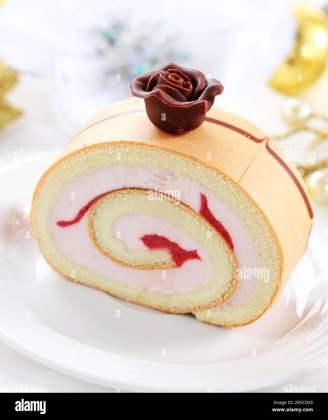 Sweet whipped cream cake with chocolate rose Stock Photo - Alamy