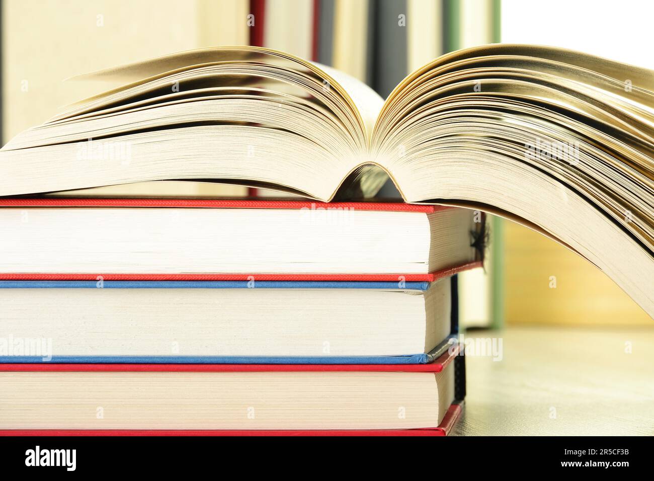 Composition with books on the table Stock Photo - Alamy