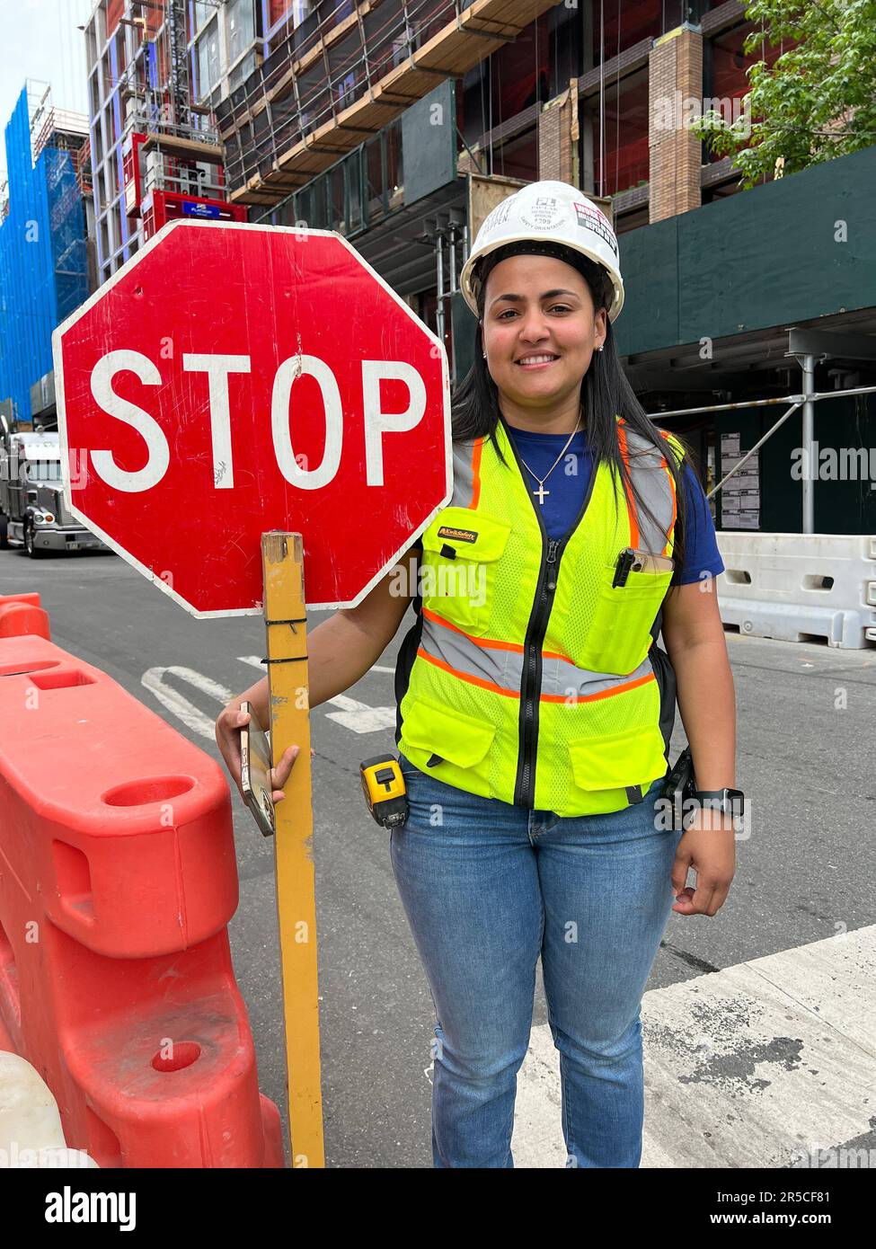 Construction worker stop traffic woman hi-res stock photography and ...