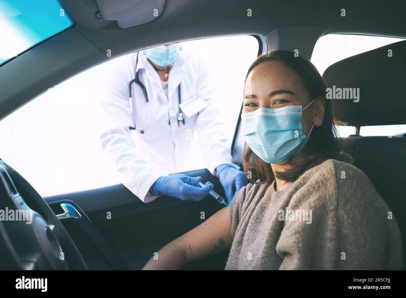 Needles dont scare me, getting sick does. a masked young woman ...