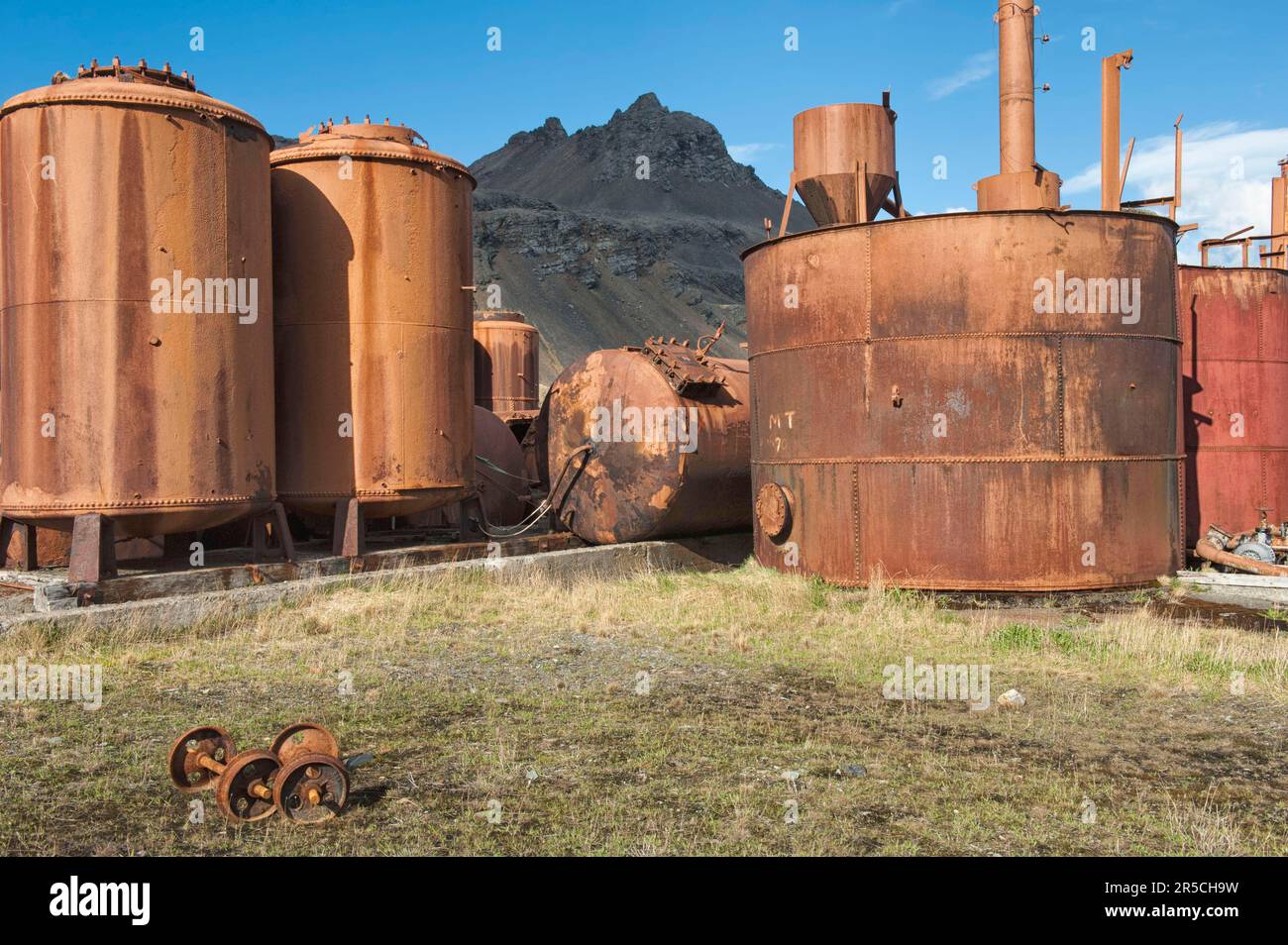 Rusty metal tanks, enacted whaling station, rusty whaling ship ...