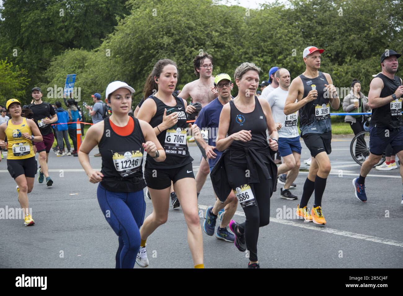 Runners come out of Prospect Park at the half way point of the Brooklyn ...