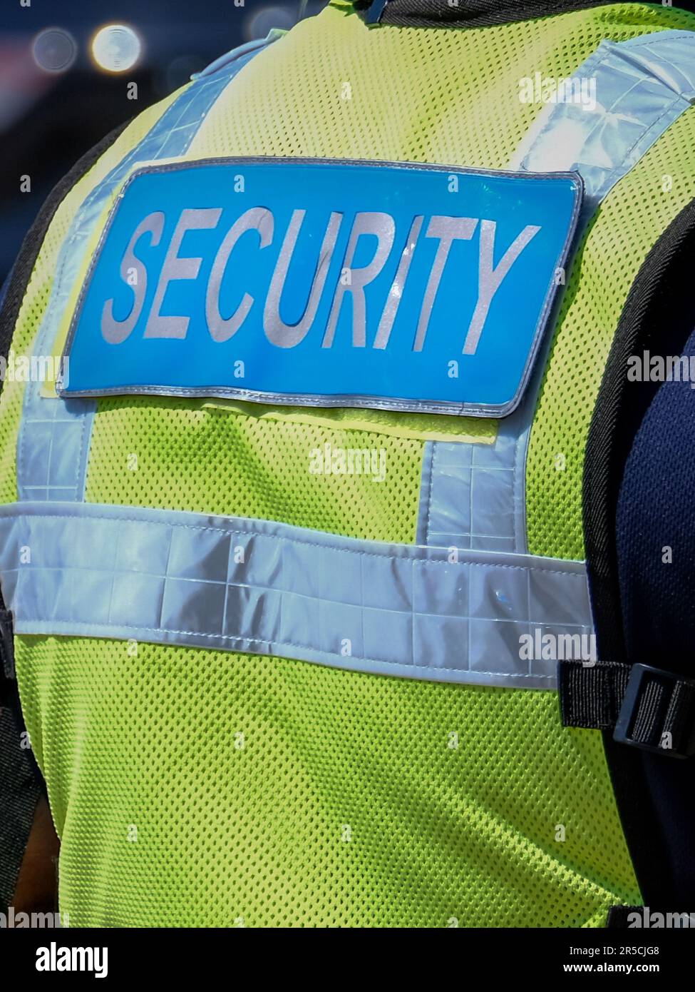 Photo of a security guard showing the word 'security' on his back Stock ...