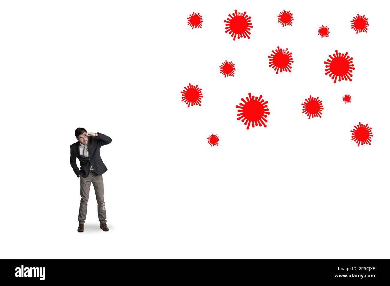 The world is under attack. a businessman being attacked by a virus ...
