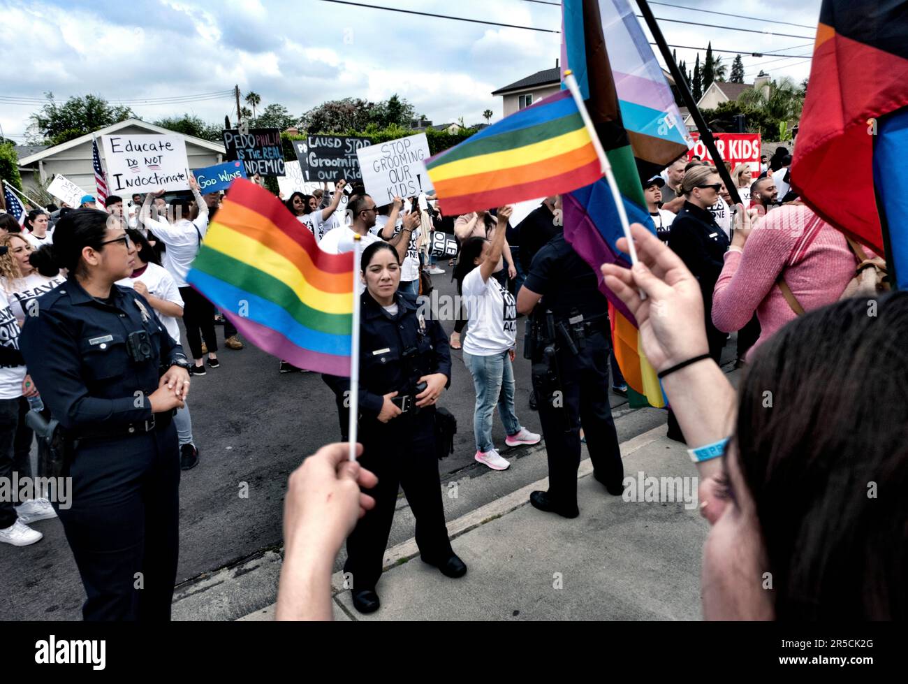 LGBTQ counter-protesters wave Pride Flags as Los Angeles police ...
