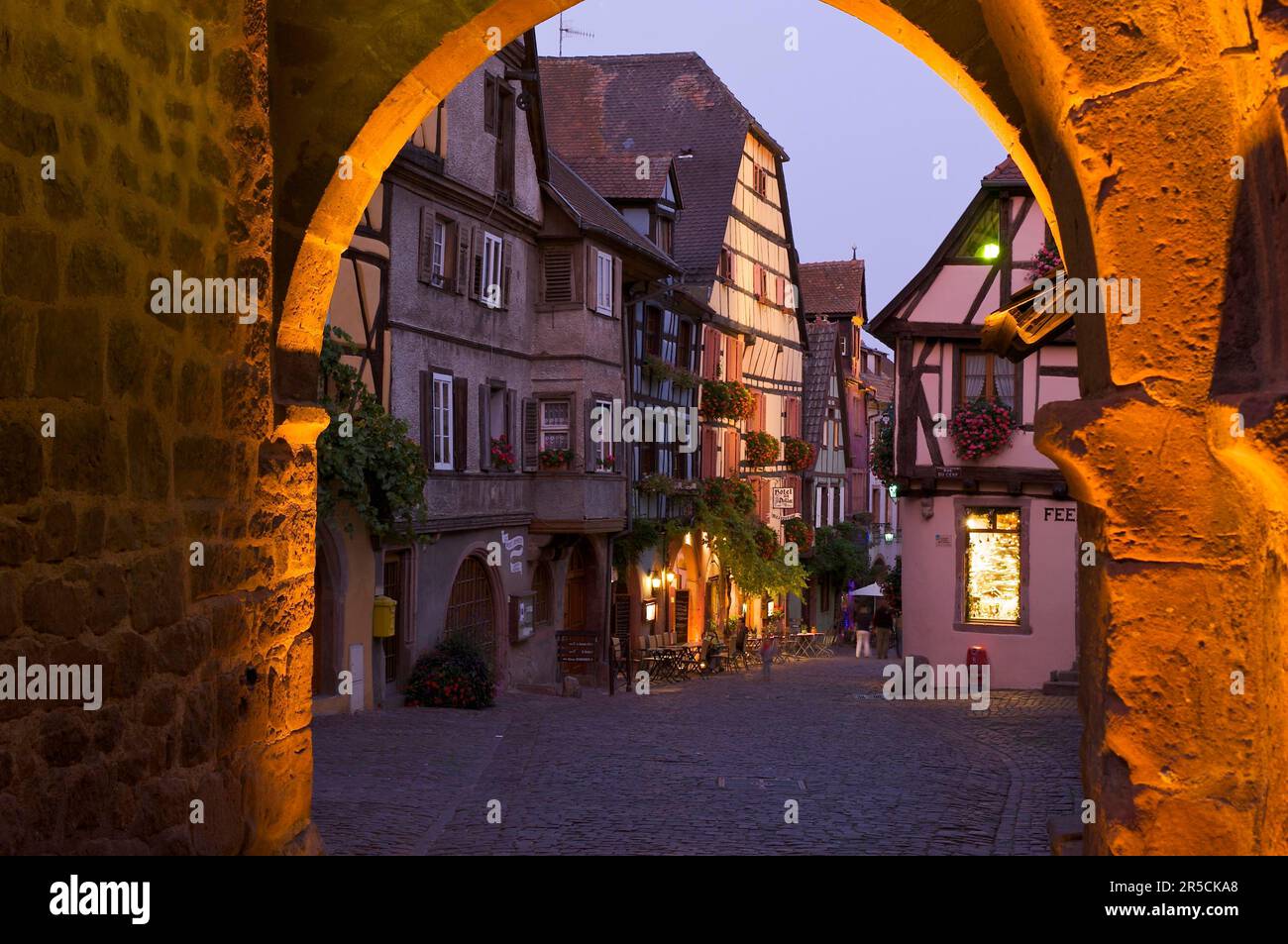 View through the Dolder Tower into the evening old town of Riquewihr ...