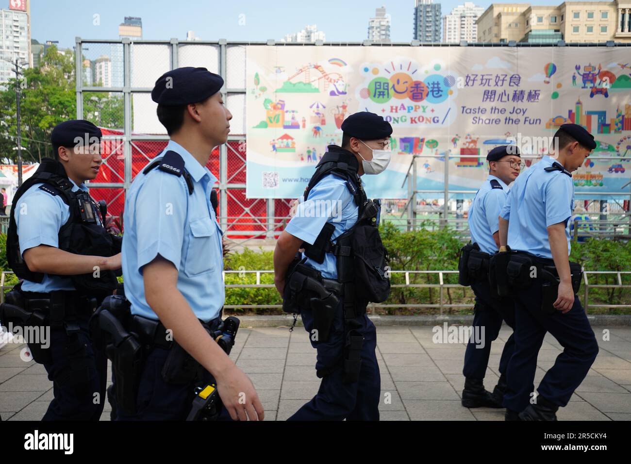 Police officers patrol around the park with gear. The upcoming Sunday ...