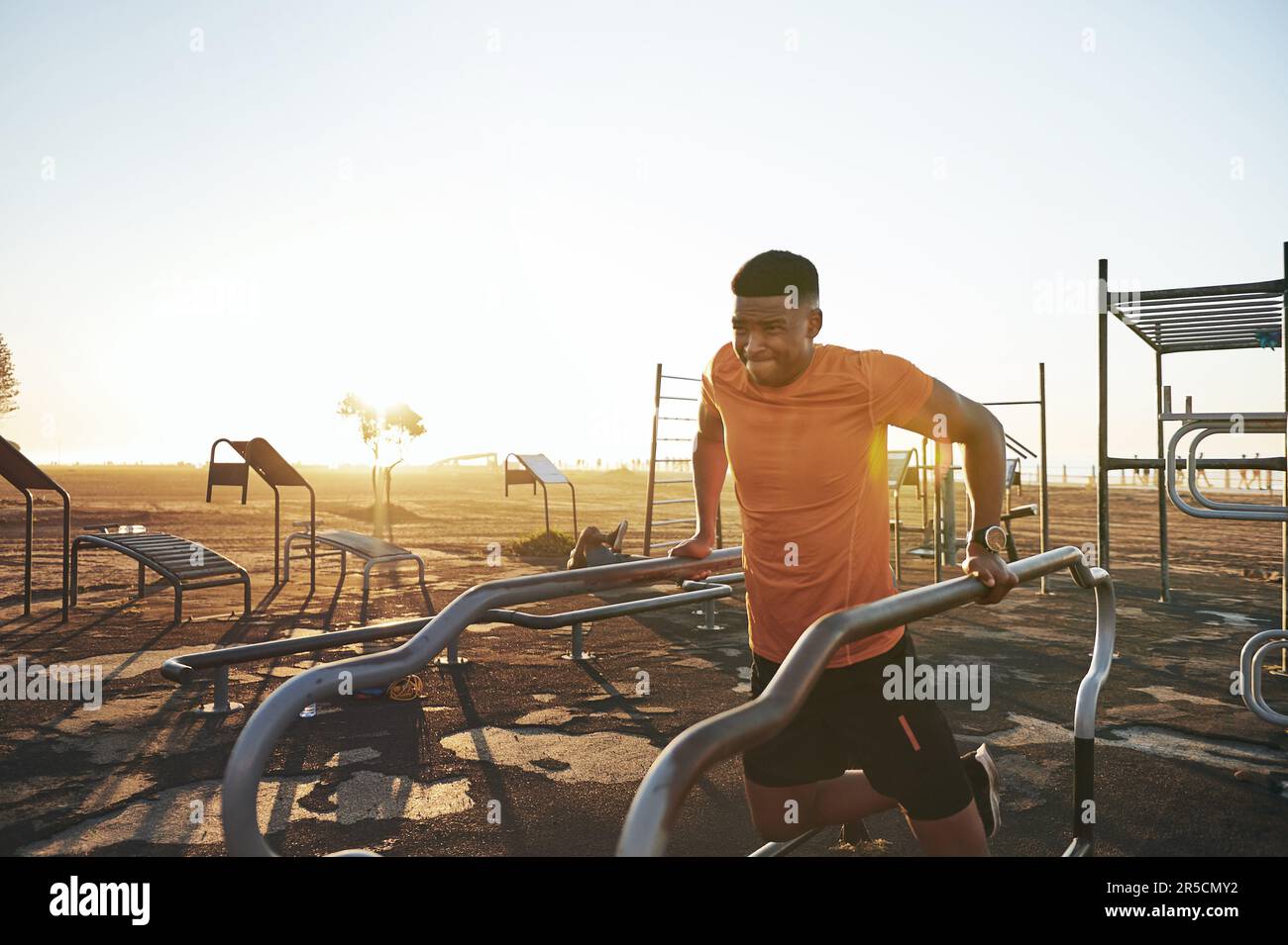 I get a full-body workout right here at the park. a young man working ...