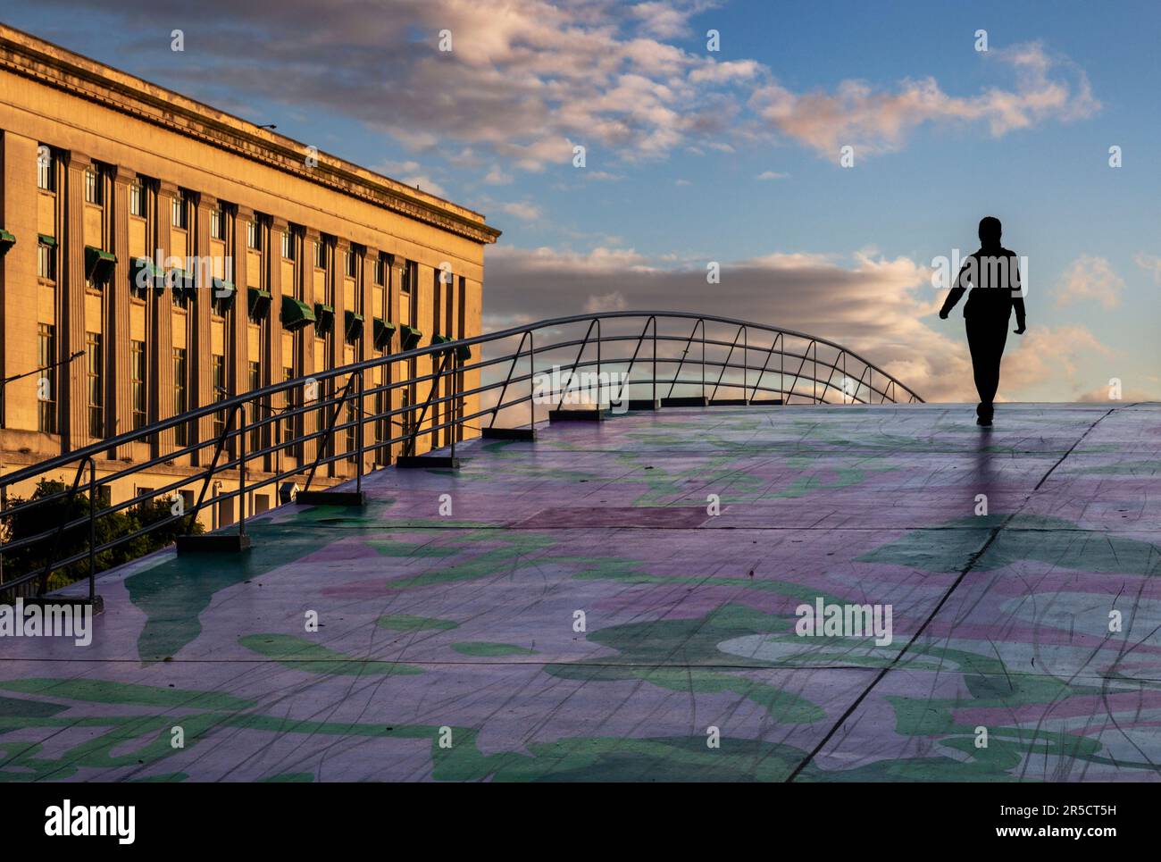 Woman walking over a pedestrian bridge in Recoleta, Buenos Aires Stock ...