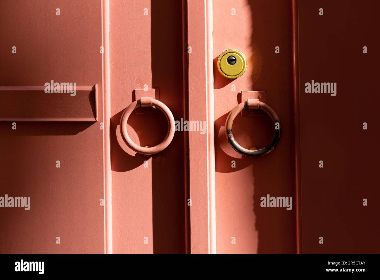 Background: Wooden coral door with metal rings close up Stock Photo - Alamy