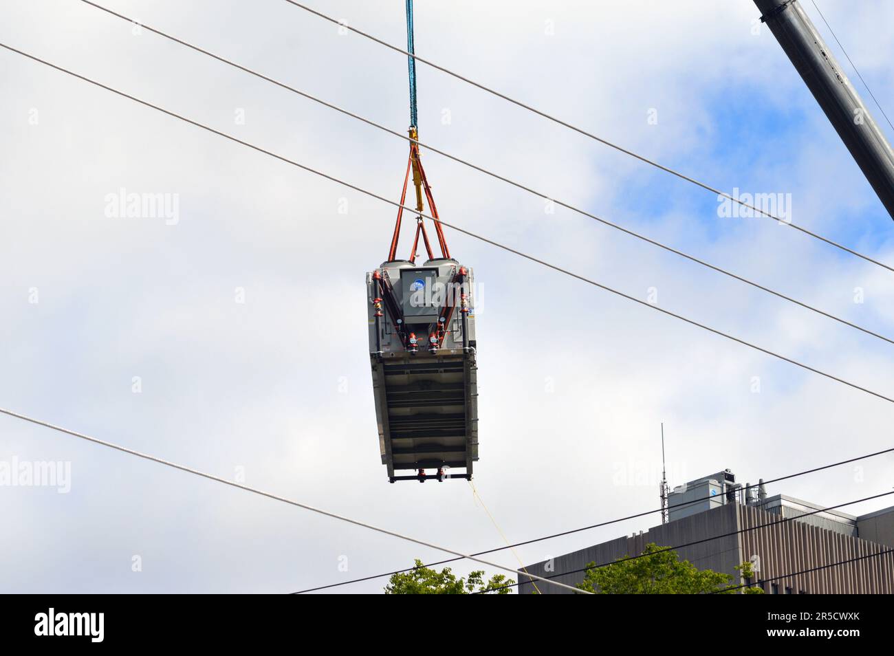 Air handling unit being lifted onto a rooftop Stock Photo - Alamy