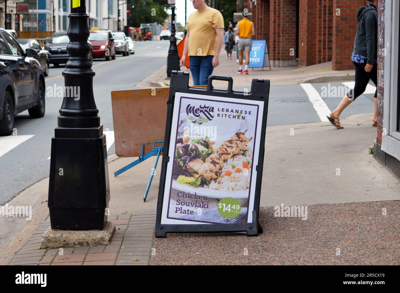 Sidewalk on Barrington Street in downtown Halifax obstructed by a ...