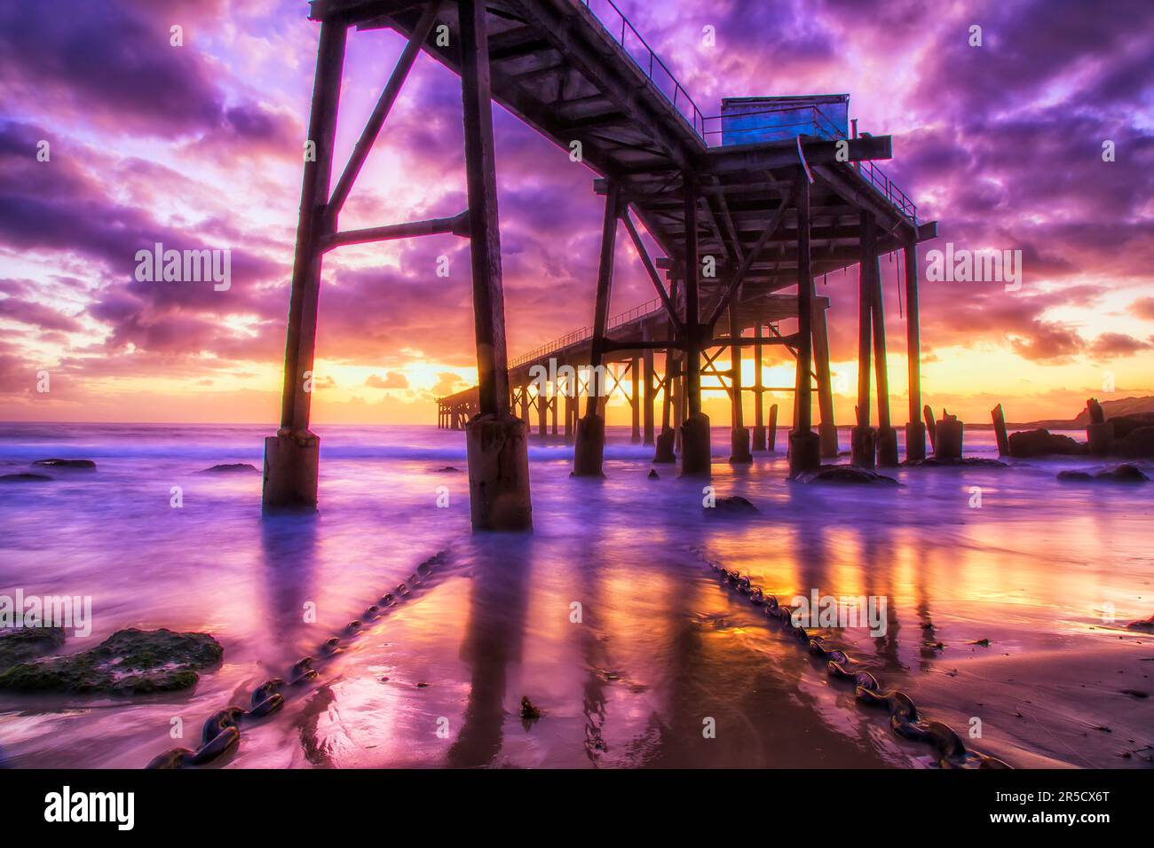 Scenic colourful sunrise from MIddle camp beach in Catherine hill bay ...
