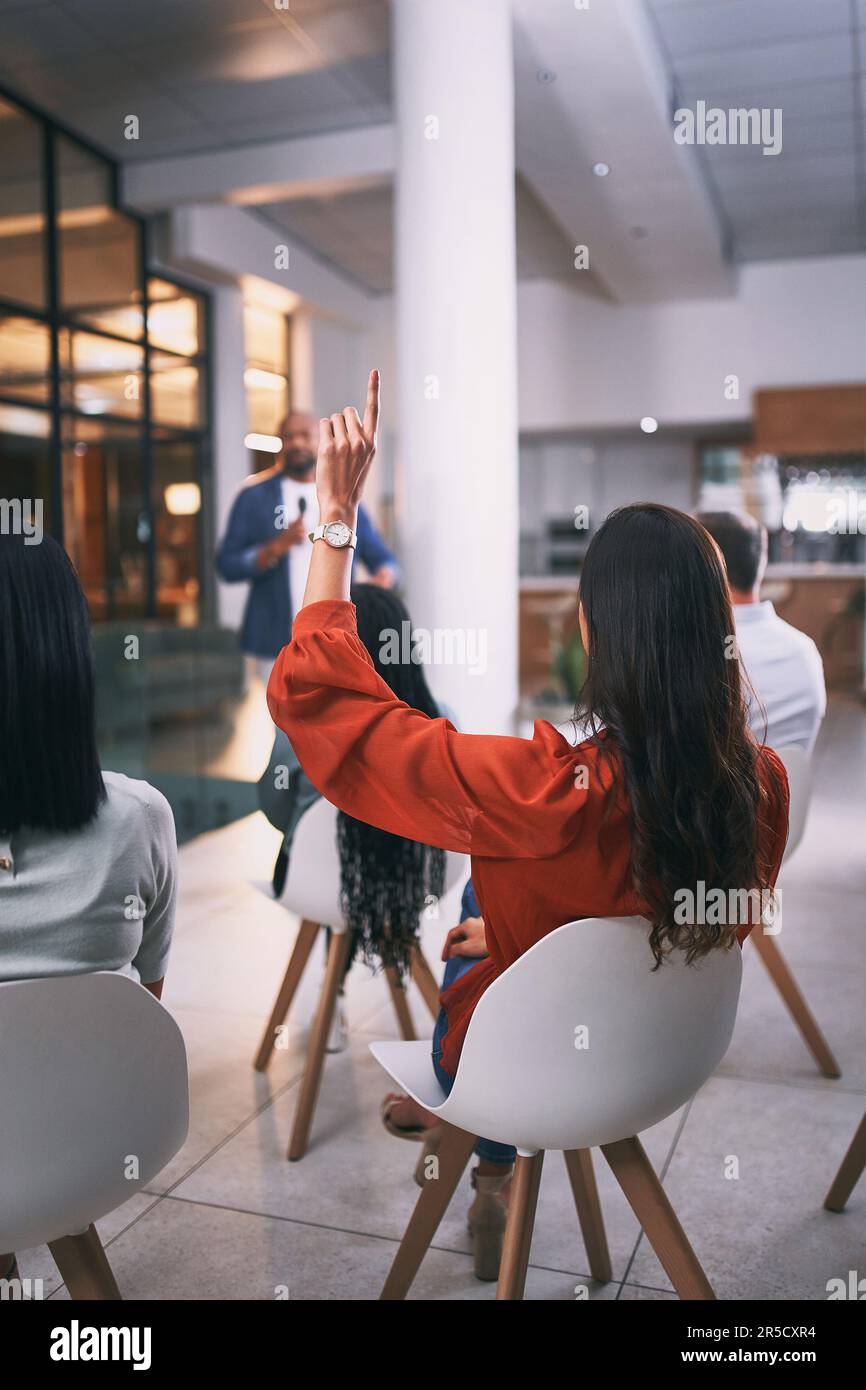 Woman raising finger ask hi-res stock photography and images - Alamy