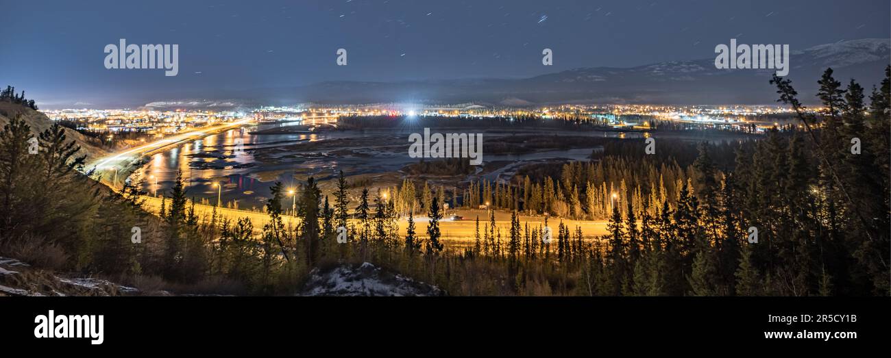 Aerial, panorama shot of Whitehorse city in northern Canada, capital of Yukon Territory. Taken ...