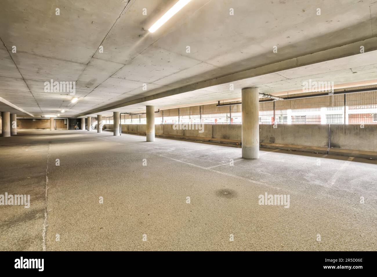 an empty parking area with no people or vehicles in the photo is taken ...