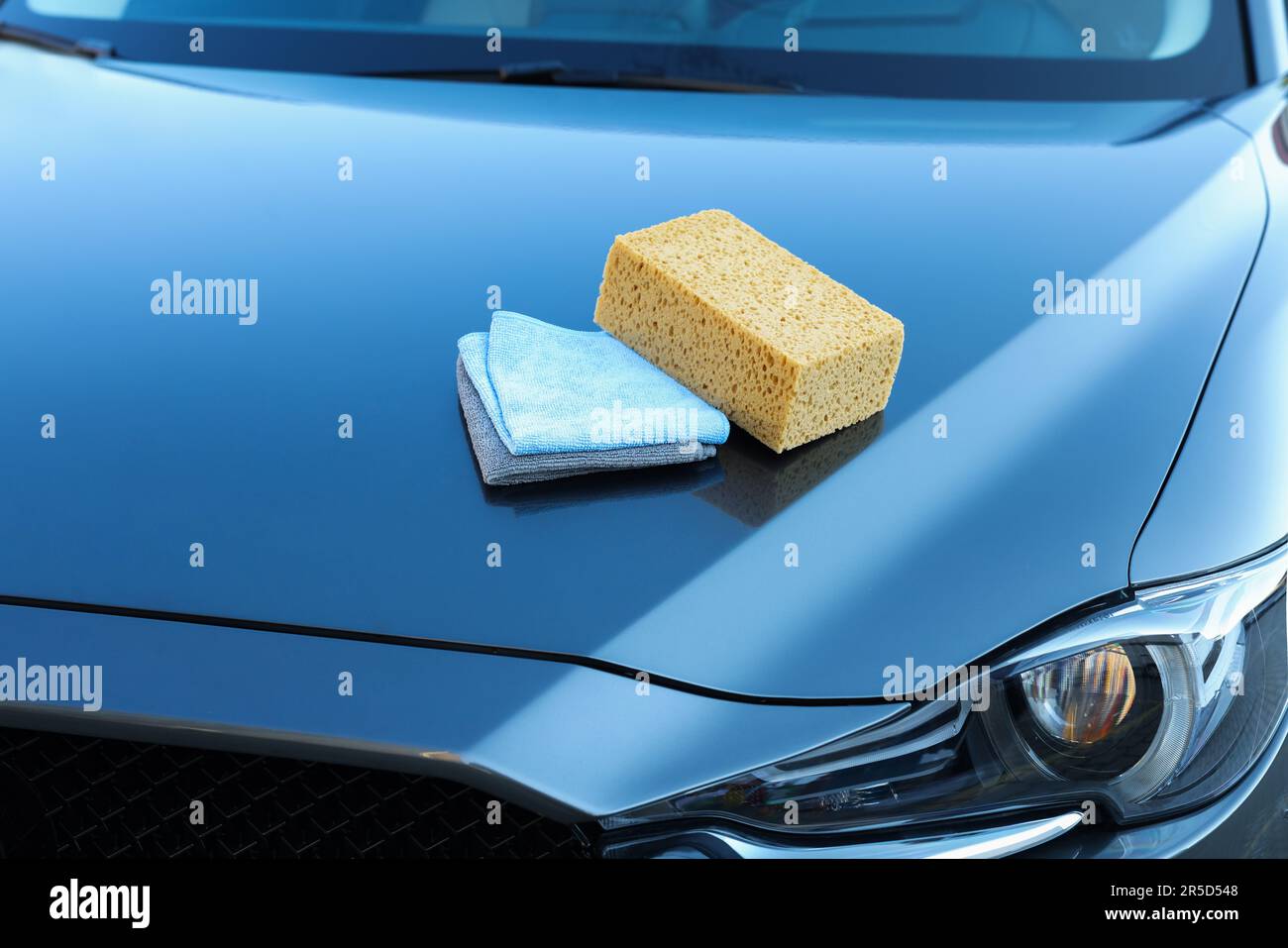 Car hood cleaning hi-res stock photography and images - Alamy