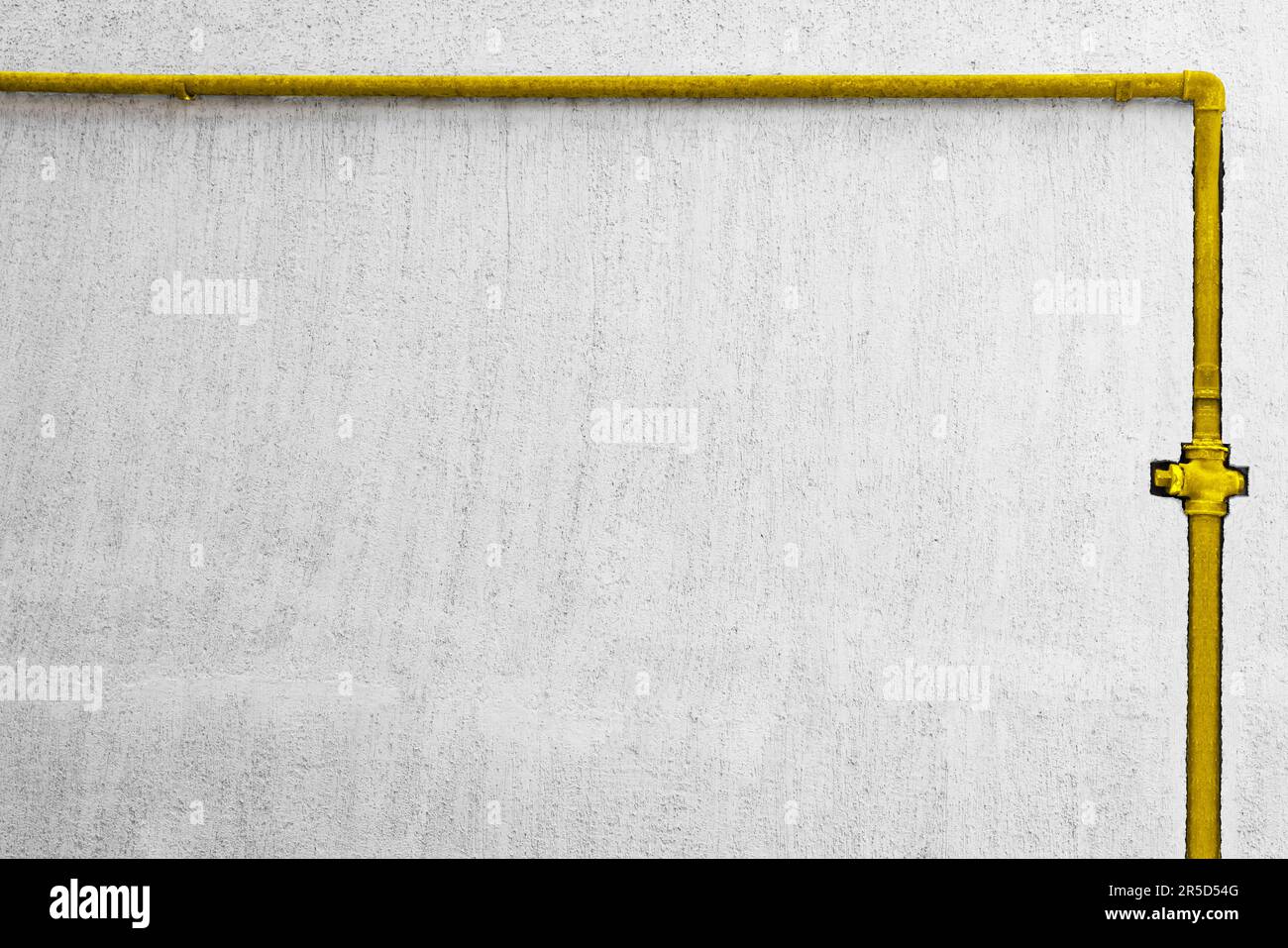 Rusty gas pipe installed in white wall outdoors, space for text Stock ...