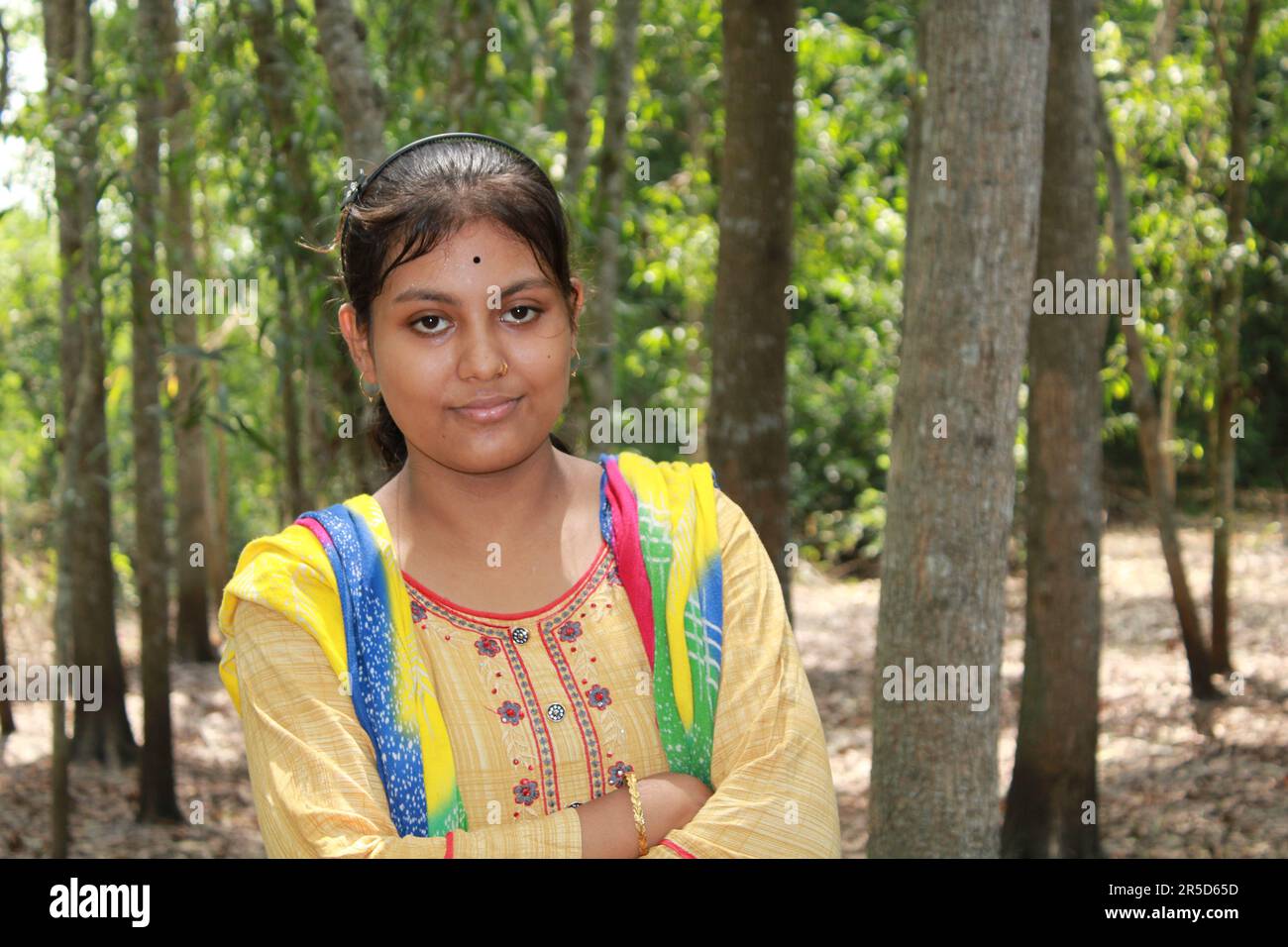Close up of a beautiful teenage Indian Odia girl wearing colorful Dress ...