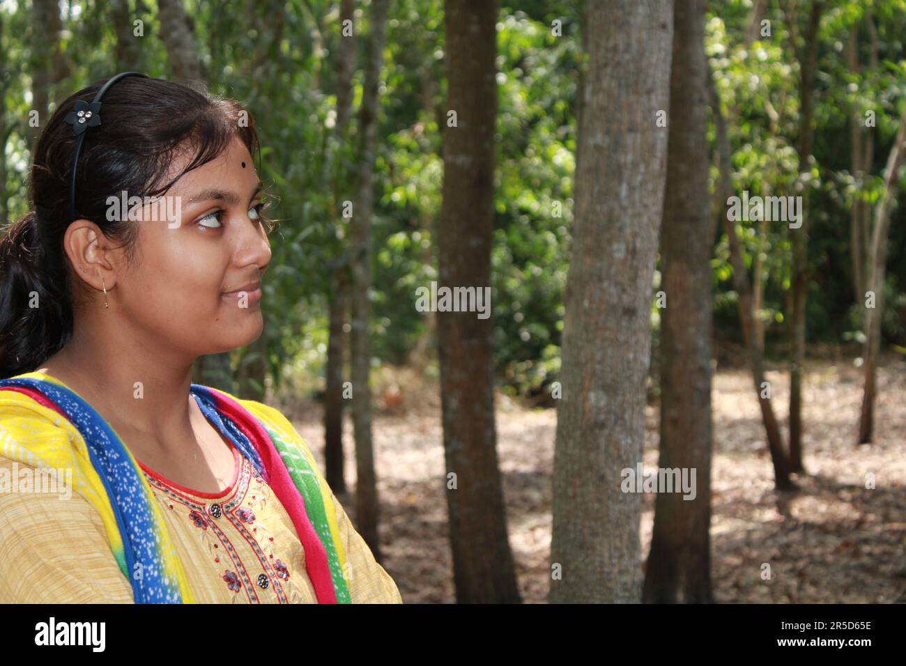 Close up of a beautiful teenage Indian Odia girl wearing colorful Dress ...