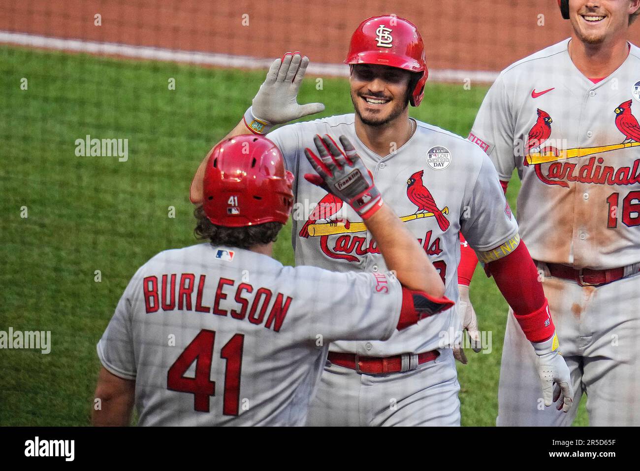 St. Louis Cardinals' Nolan Arenado, center, celebrates with Alec ...