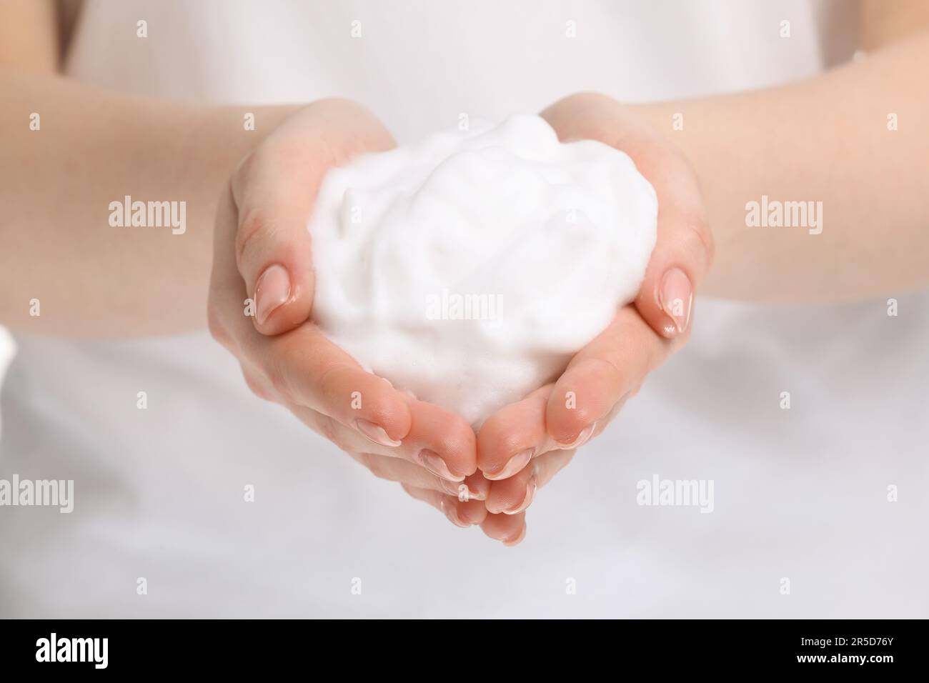 Woman with bath foam on white background, closeup Stock Photo - Alamy