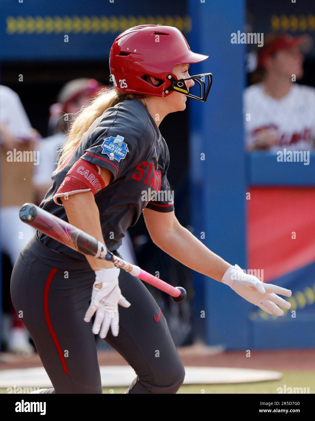 Stanford's Taylor Gindlesperger drops her bat after hitting a double against Alabama during the ...