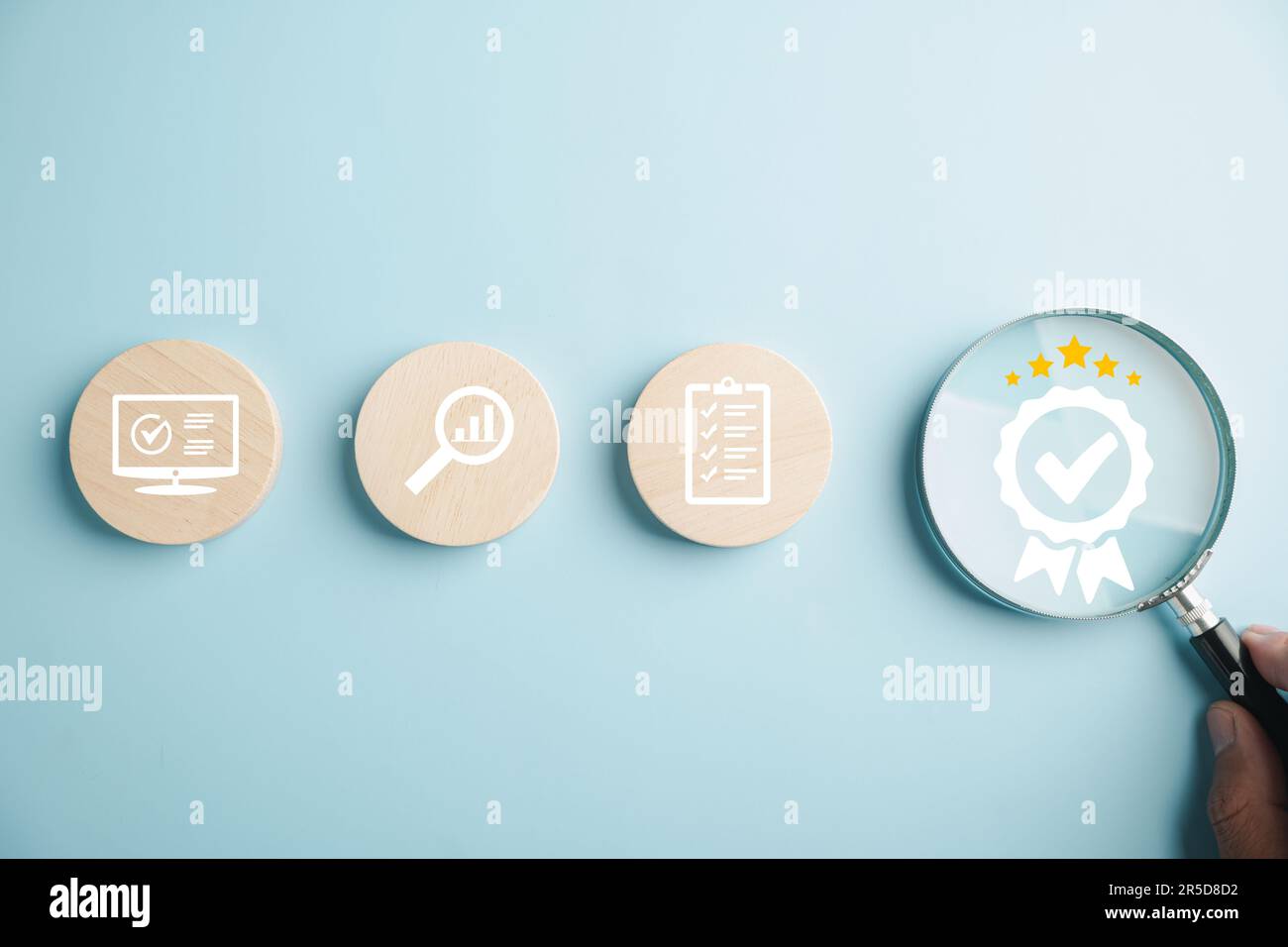 Certification and ISO quality concept illustrated with a magnifying ...