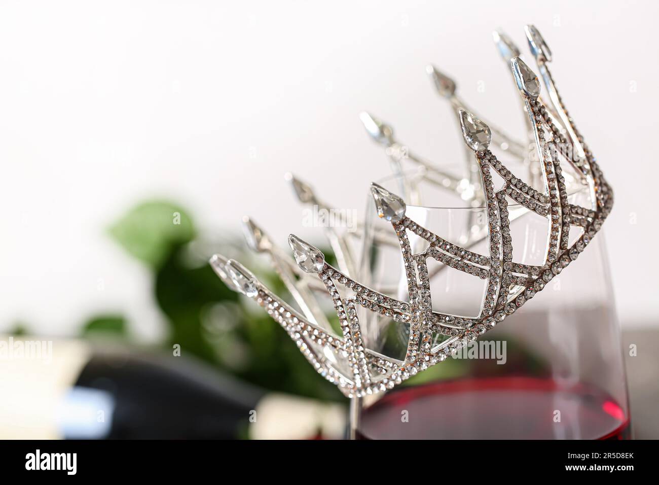 Glass of wine with crown, closeup. Prom concept Stock Photo - Alamy