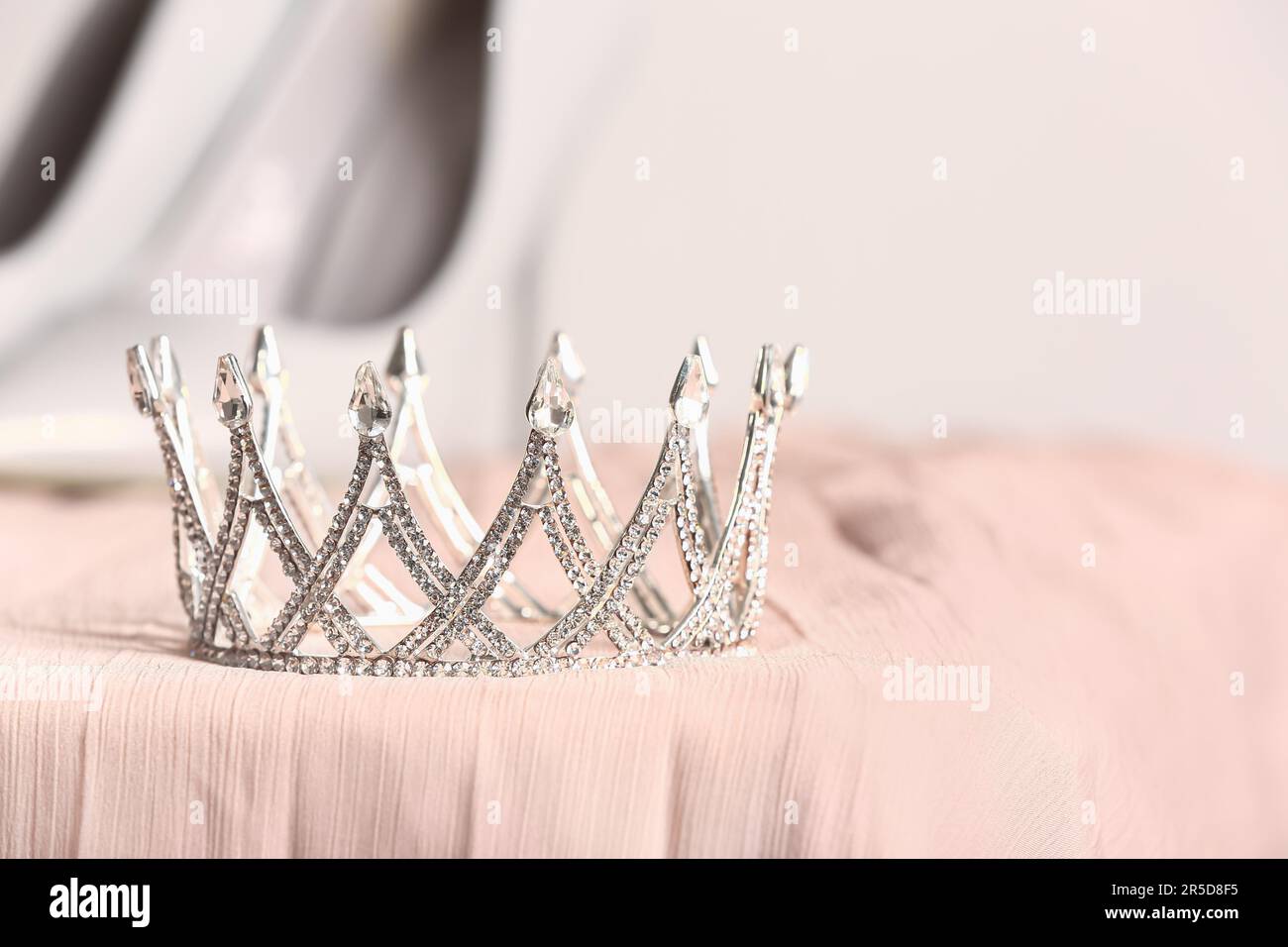 Beautiful tiara on prom dress, closeup Stock Photo - Alamy
