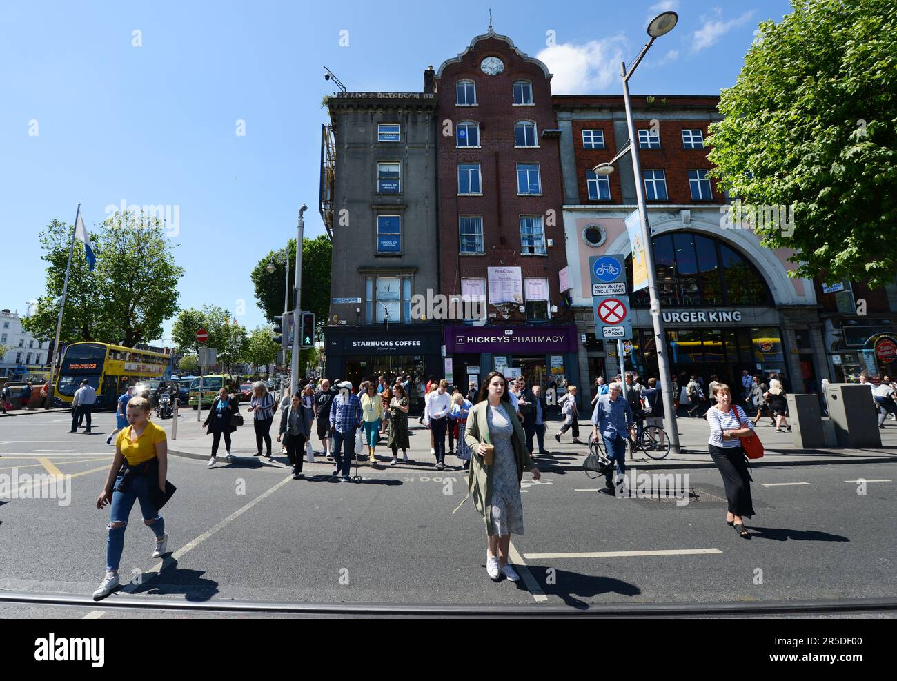 Pedestrians crossing O'Connell Street in Dublin, Ireland Stock Photo ...