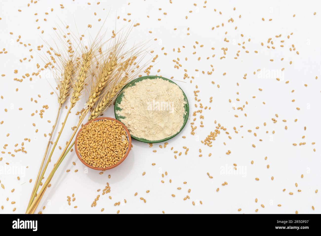 Wheat flour with wheat in bowl flat lay isolated on white background ...