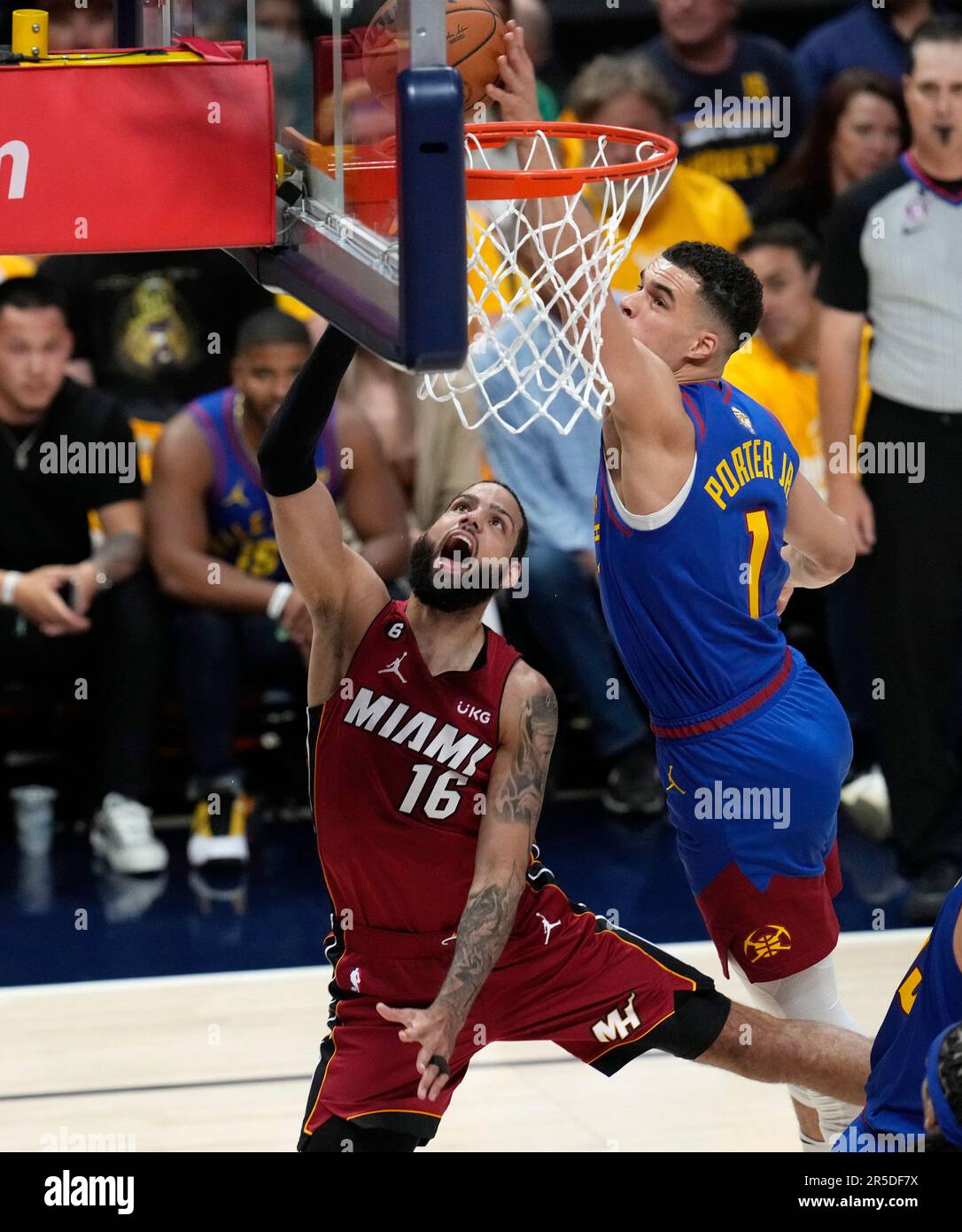 Miami Heat Forward Caleb Martin 16 Has His Shot Blocked By Denver
