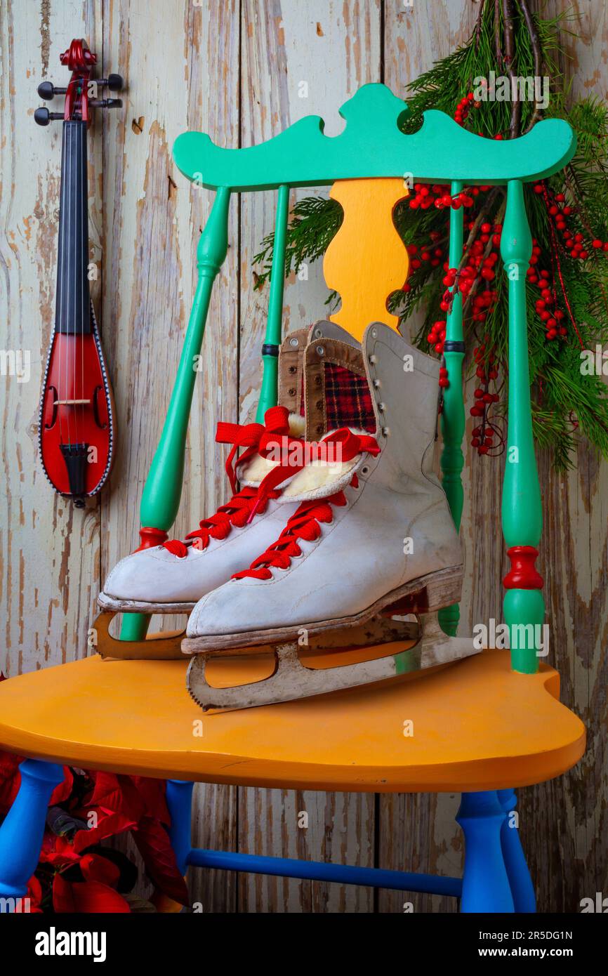Old Vintage Ice Skates On Colorful Chair Still Life Stock Photo - Alamy