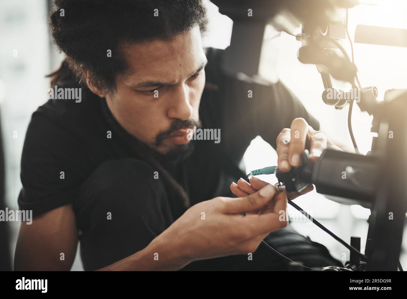 Male operator working wires in hi-res stock photography and images - Alamy
