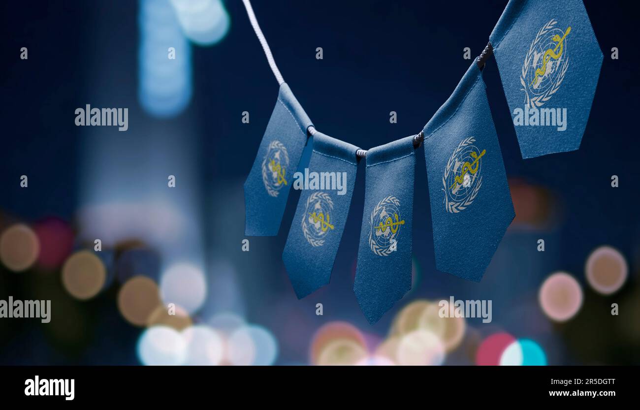 A garland of World Health Organization WHO national flags on an ...