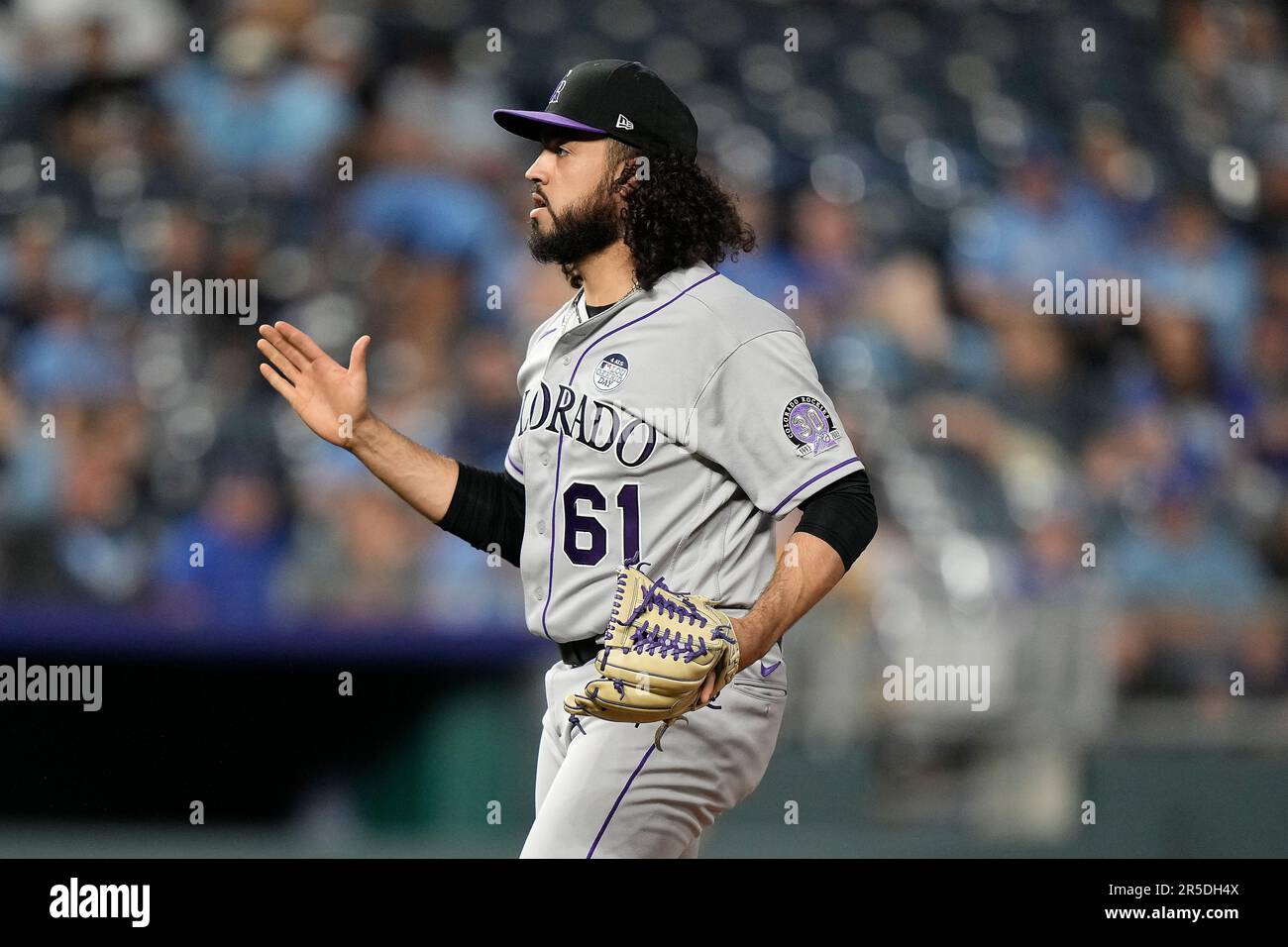 Colorado Rockies relief pitcher Justin Lawrence celebrates after a ...