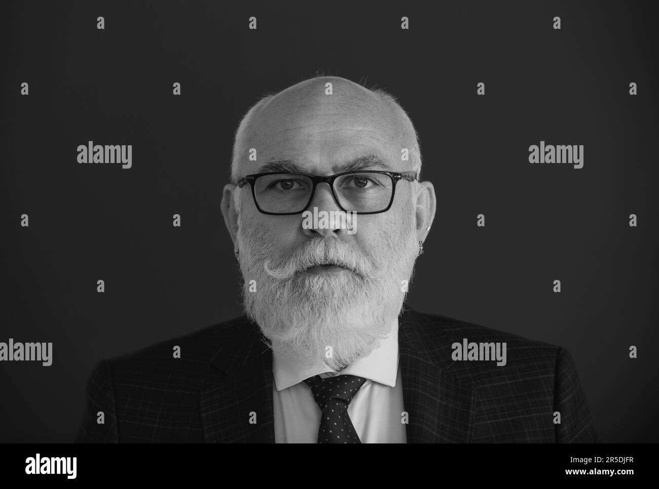 Closeup portrait of old male professor. Portrait of man with copy space ...