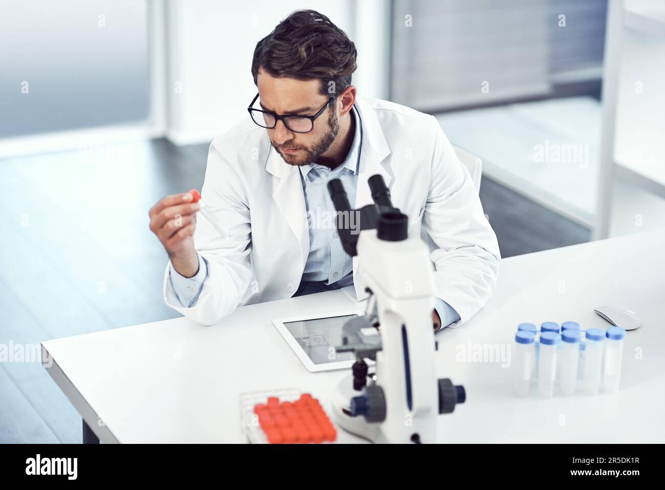 This will make a difference in the world. a focused young male ...