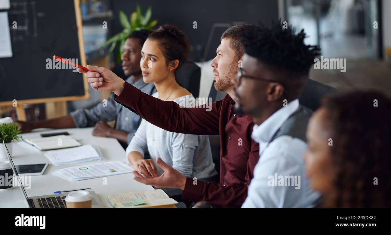 Raising a few issues. a panel of businesspeople giving feedback during ...