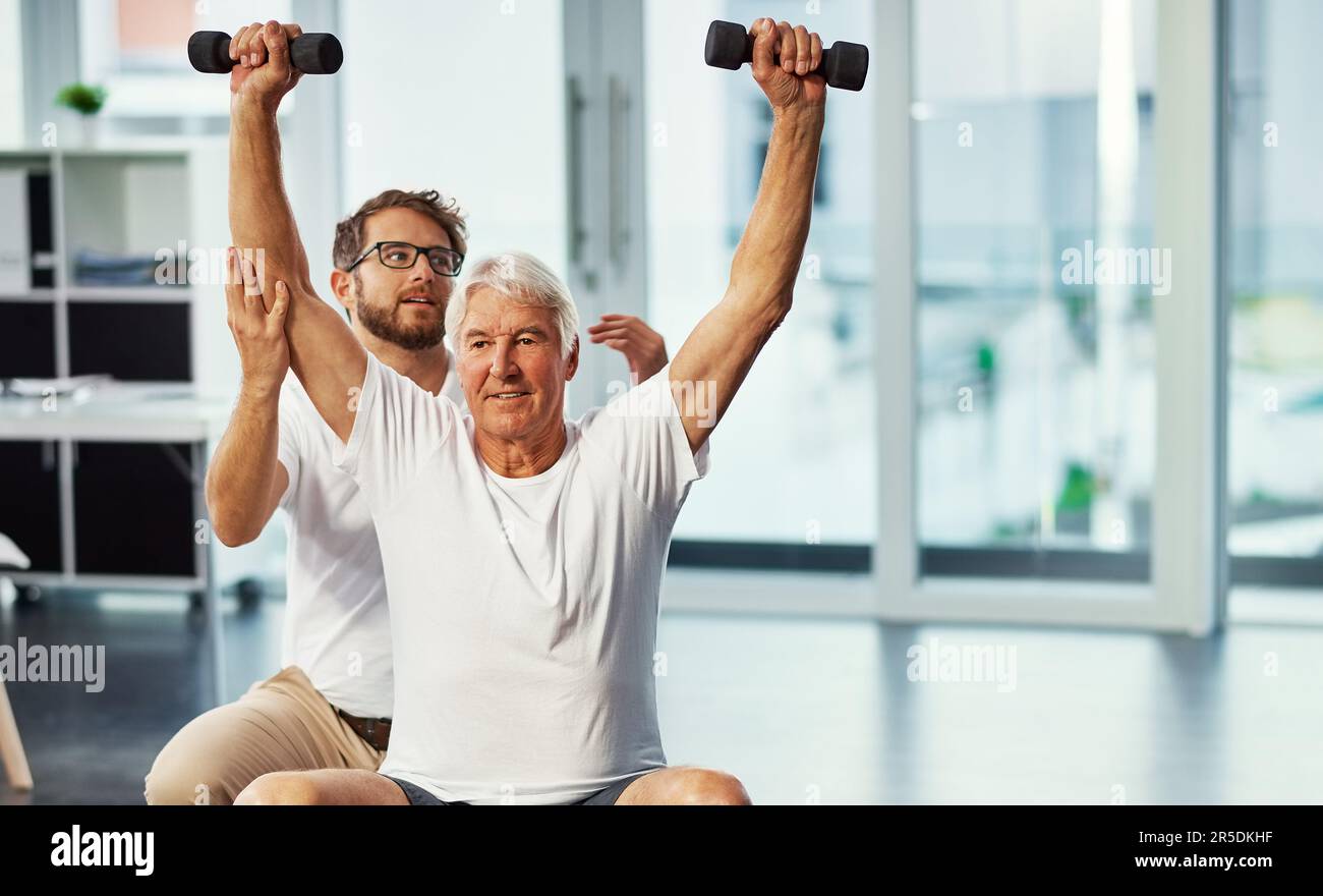 Raising his fitness levels. a senior man working on his recovery with a ...