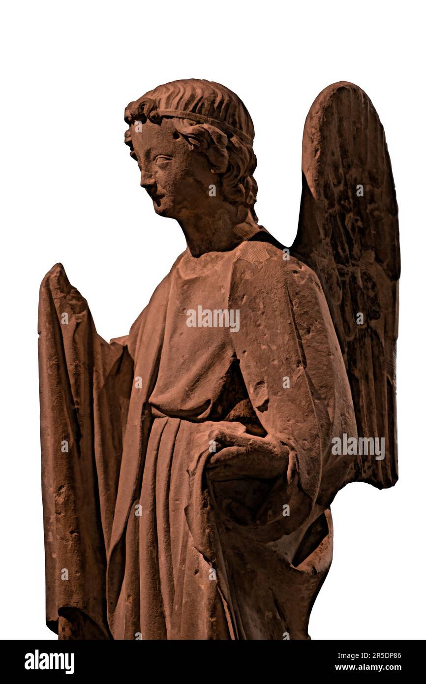 Medieval stone winged angel sculpture. Angel has draped tunic, headband ...