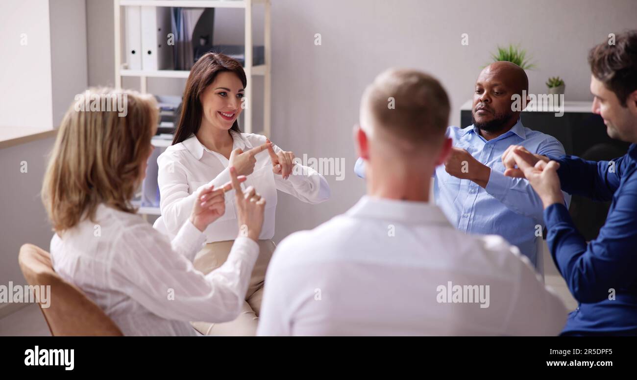 Sign Language Learning For Deaf People With Disabilities Stock Photo ...