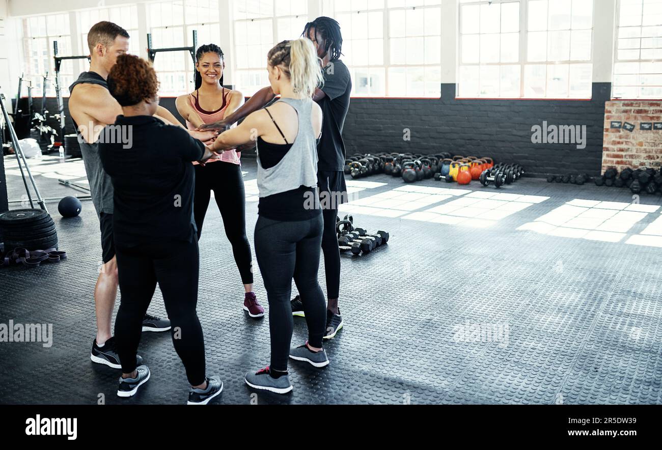 All about that fitness. a cheerful young group of people forming a ...