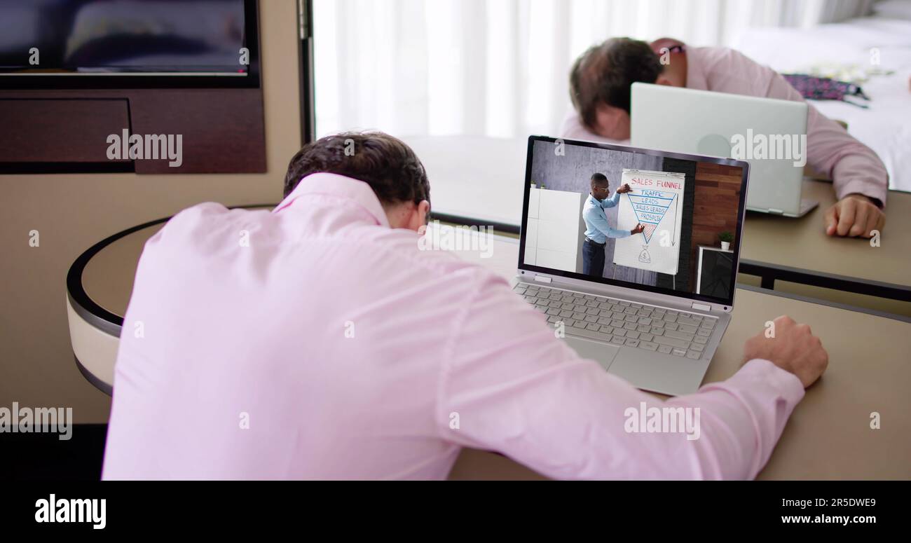 Bored Employee In Video Conference Training Meeting Stock Photo - Alamy