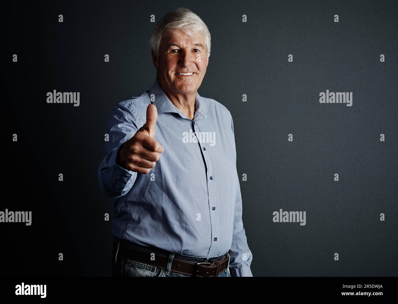 Feeling positive. Studio portrait of a handsome mature man giving you ...