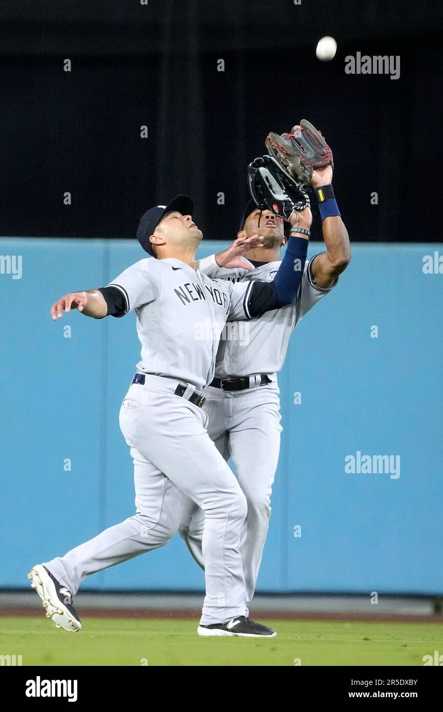New York Yankees center fielder Isiah Kiner-Falefa, left, and center ...