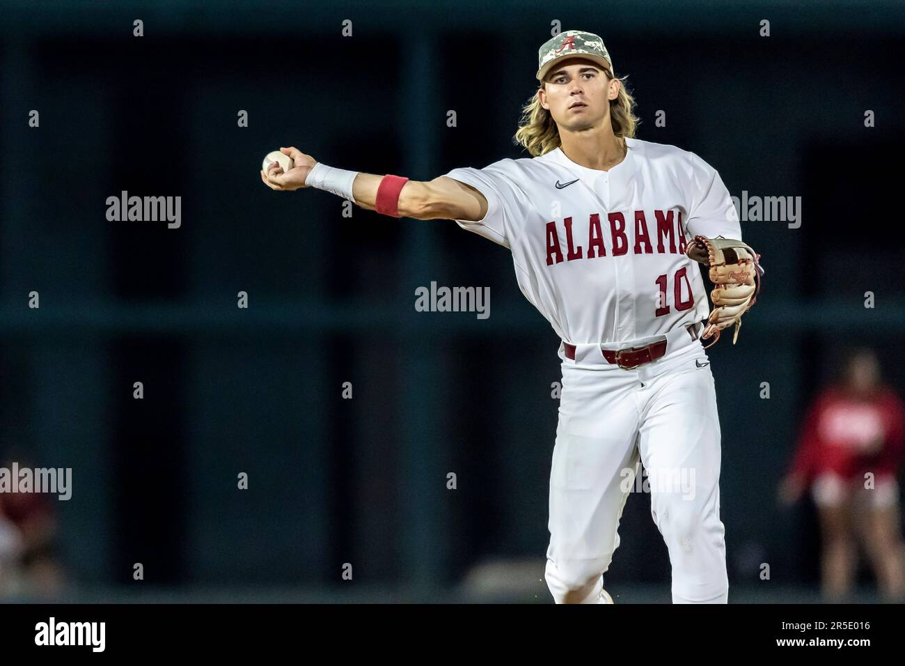 Alabama infielder Jim Jarvis (10) delivers the ball to first for an out ...