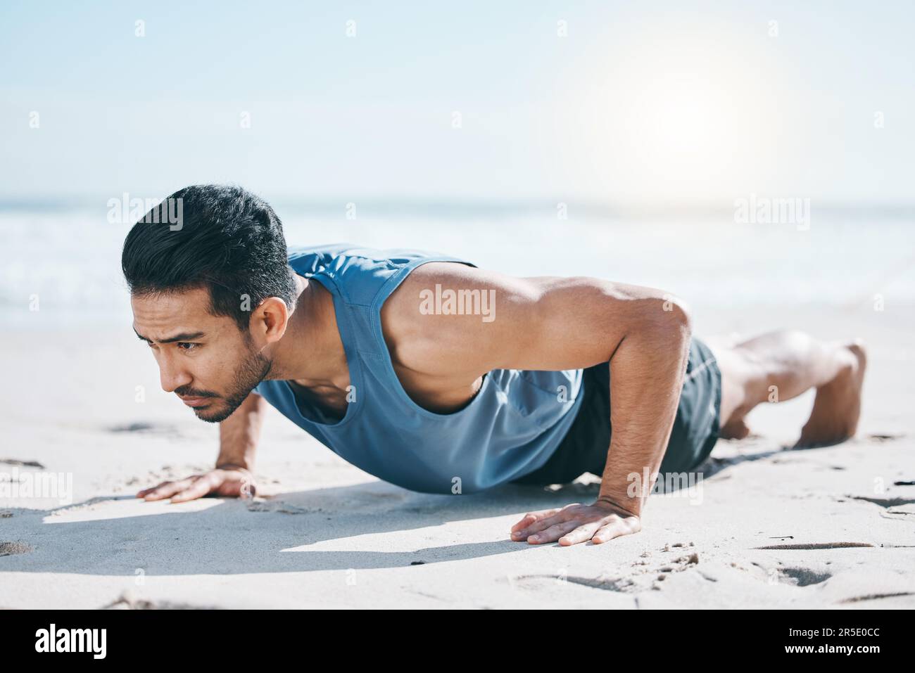 Man, beach and pushup on sand for workout, fitness or exercise for ...
