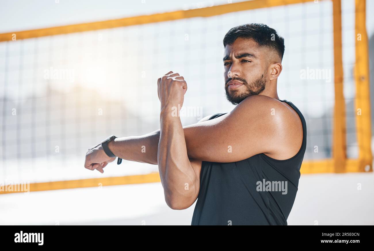 Thinking, stretching and man at beach for exercise in volleyball game ...